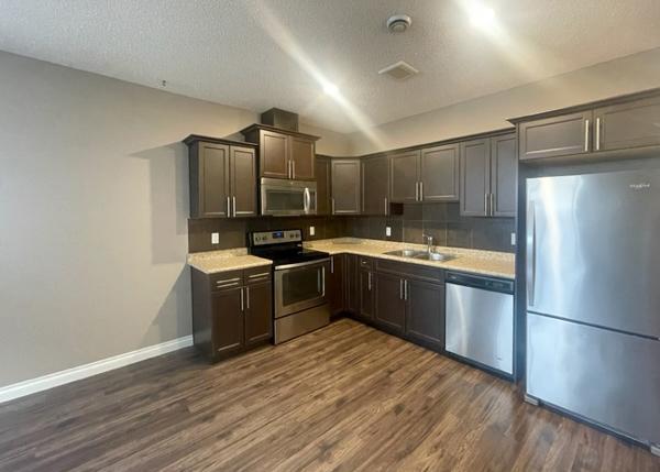 Modern and Fully Renovated Main Floor Suite | McLeod Realty ...